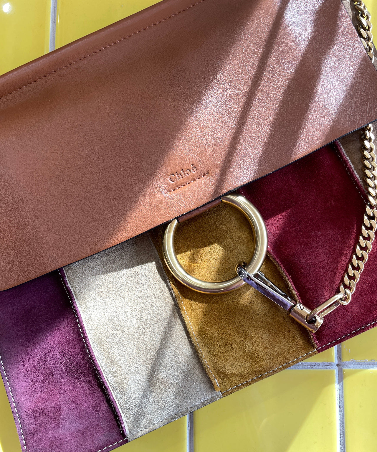 Sell your designer bags – SwapUp